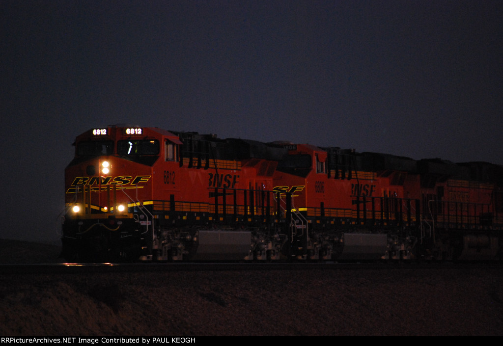BNSF 6812 with her Brand New Sister BNSF 6806 slow down to enter the yard.